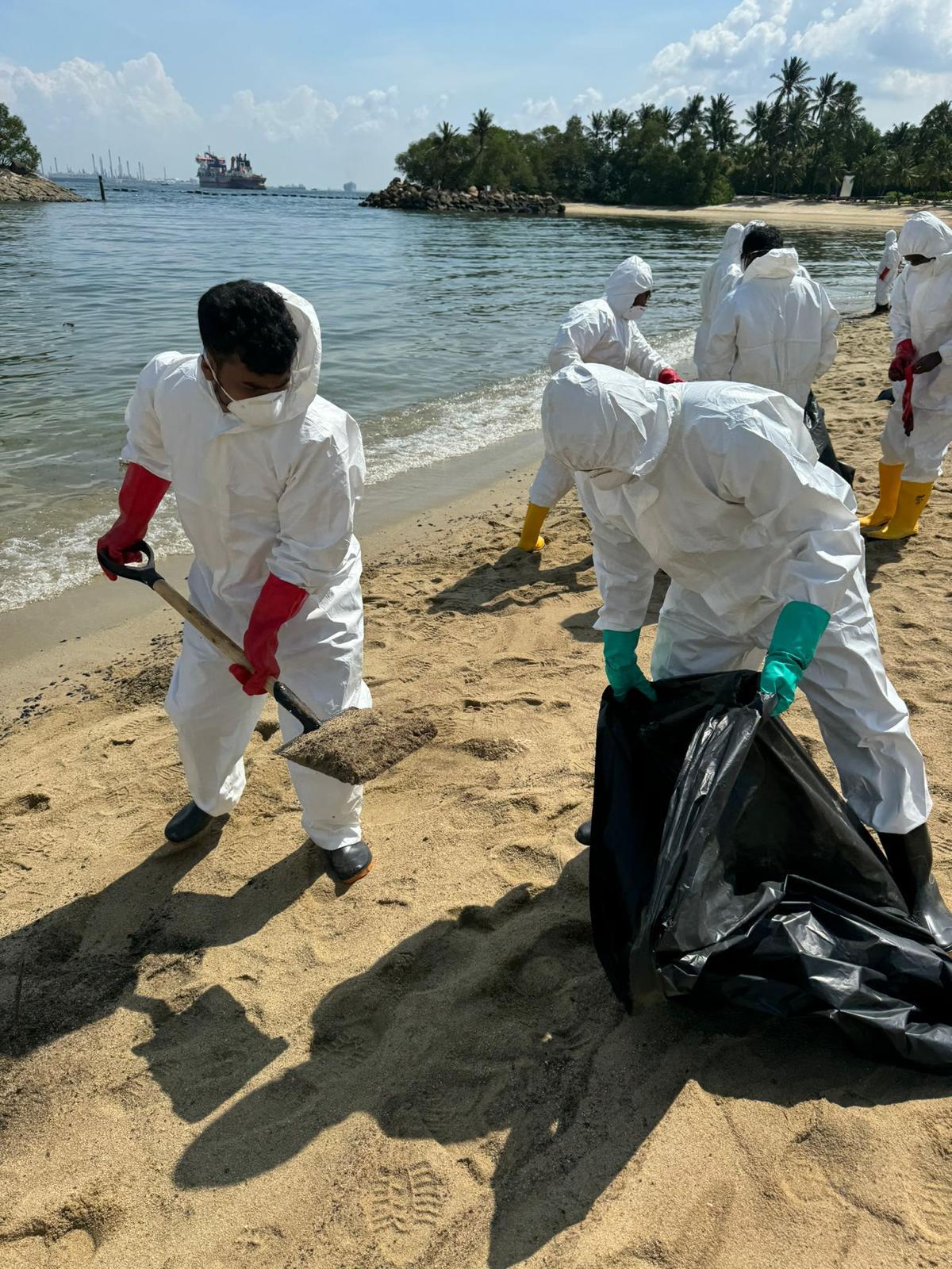 Sentosa deploys about 100 workers to beef up beach cleaning efforts ...