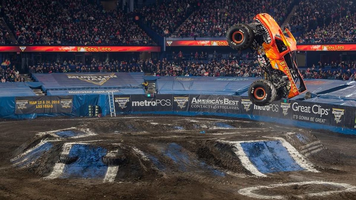 Watch massive trucks perform death-defying airborne stunts at Monster ...