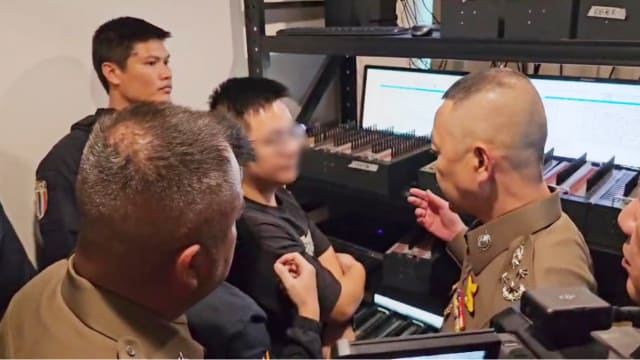 曼谷诈骗集团六华男落网 一小时能打60万通电话 - 8world