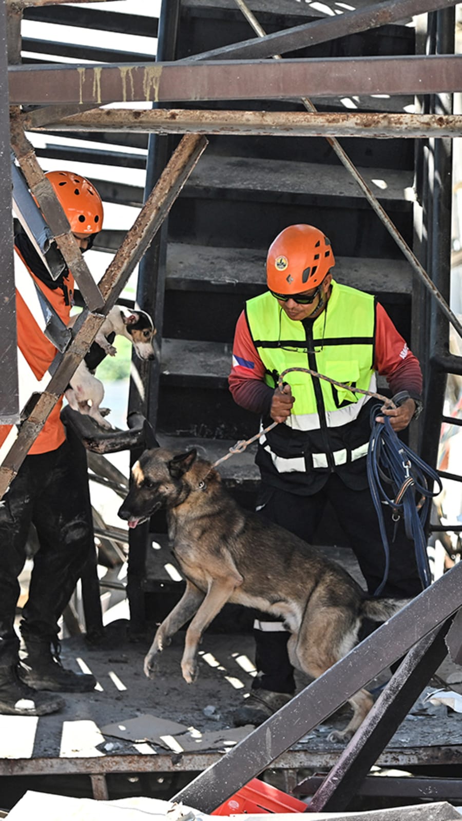 Rescuers race to reach trapped victims after powerful quake in southern ...
