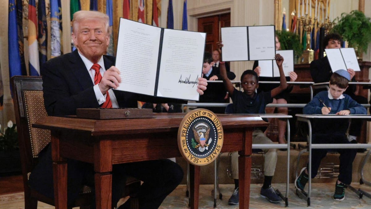 Trump signs order aimed at dismantling US Department of Education - CNA