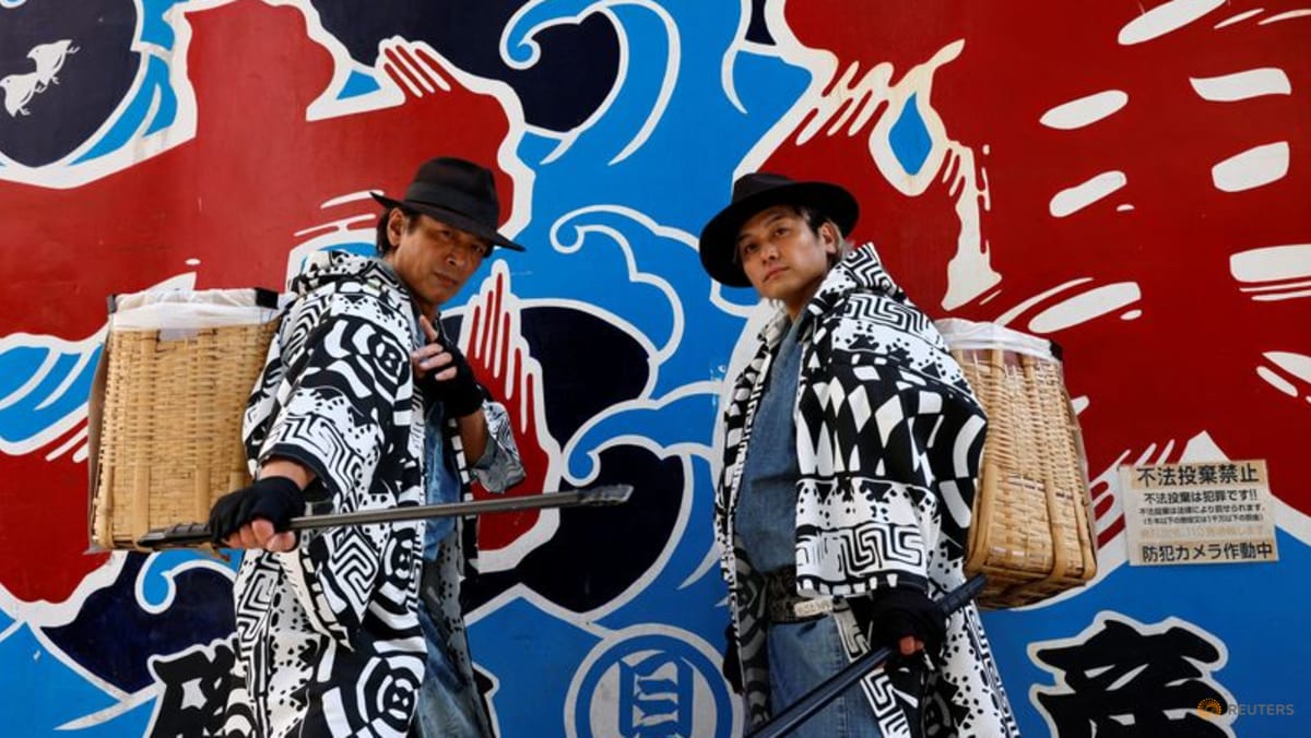 Samurai trash collectors clean Tokyo streets after Halloween revels - TODAY