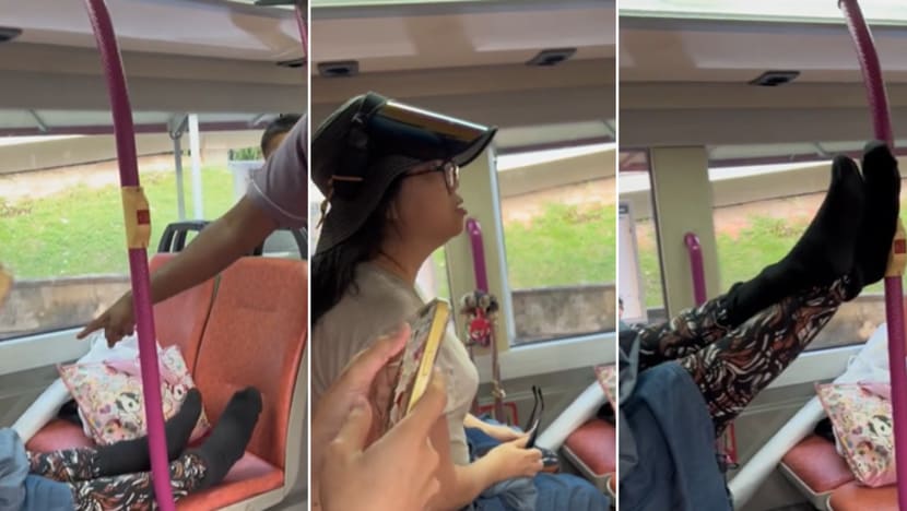 Woman who put feet up in bus hauled to court for 'hitting' driver, says ...