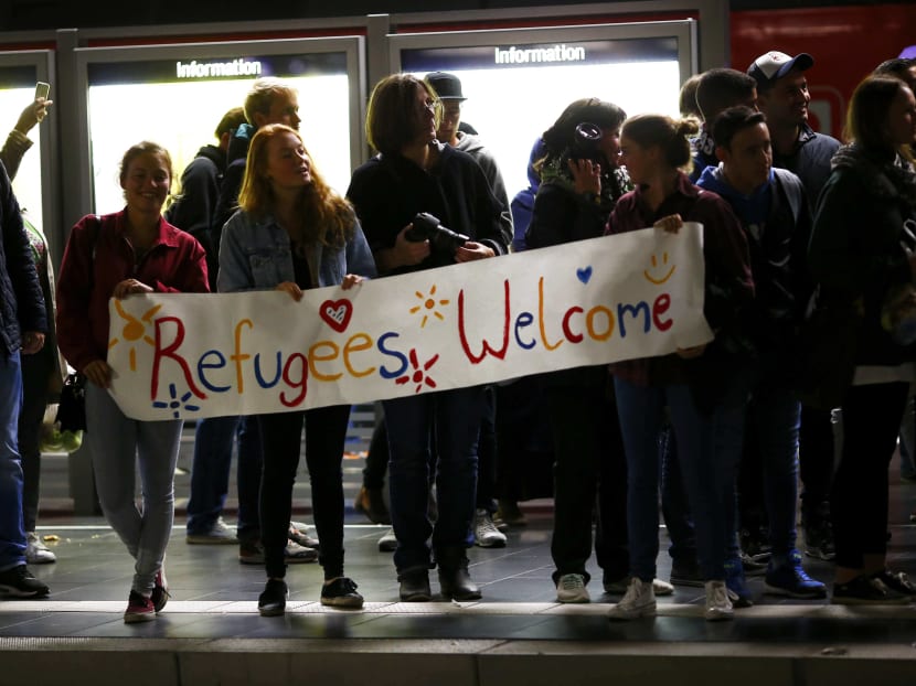 Candy and cuddly toys: Migrants finish epic trek to Germany - TODAY