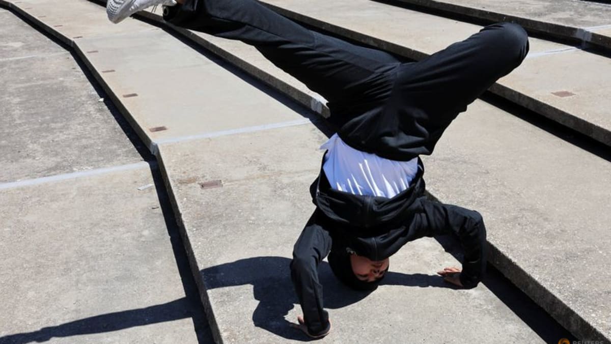 Afghanistan's first female breakdancer ready for Olympic dream - CNA