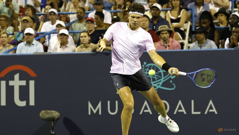 Shelton tops Tiafoe on sweltering night in Washington - CNA