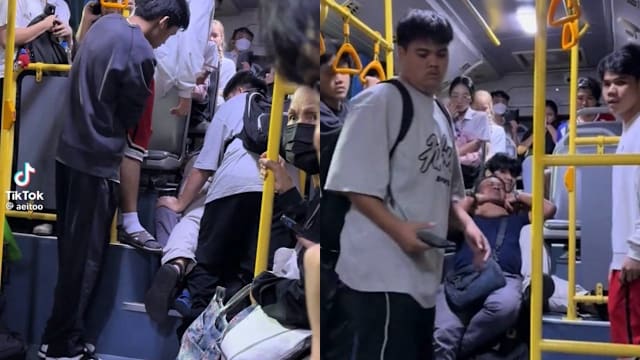 泰男巴士上偷拍女乘客裙底 被几名大学生制伏 - 8world