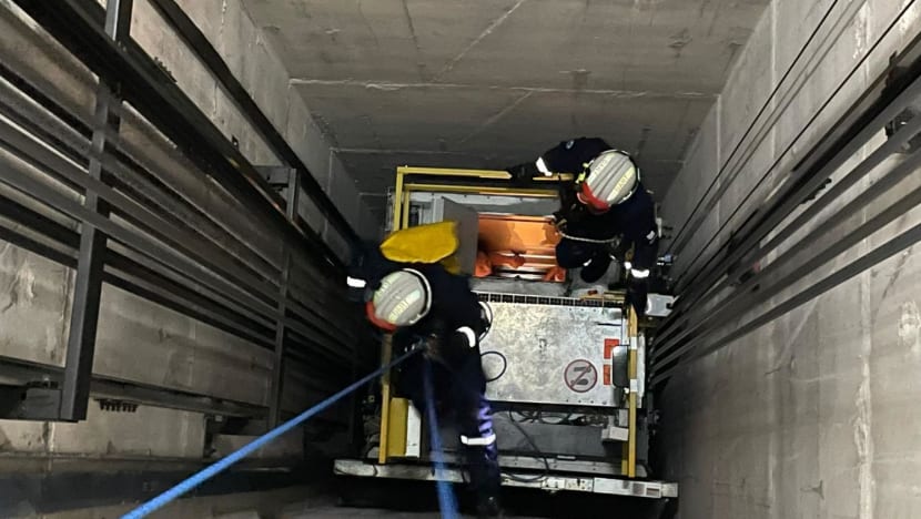 Three people rescued after getting trapped in lift - CNA