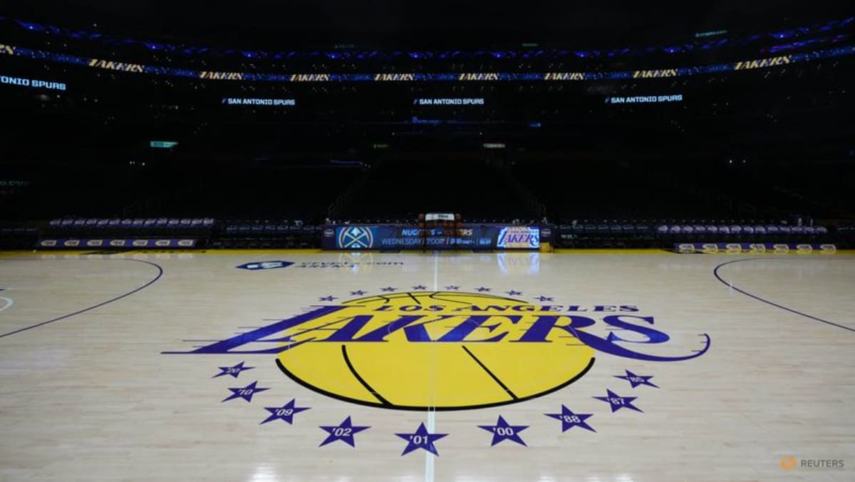 NBA-Lakers confirm sale of majority stake in franchise to Mark Walter - CNA