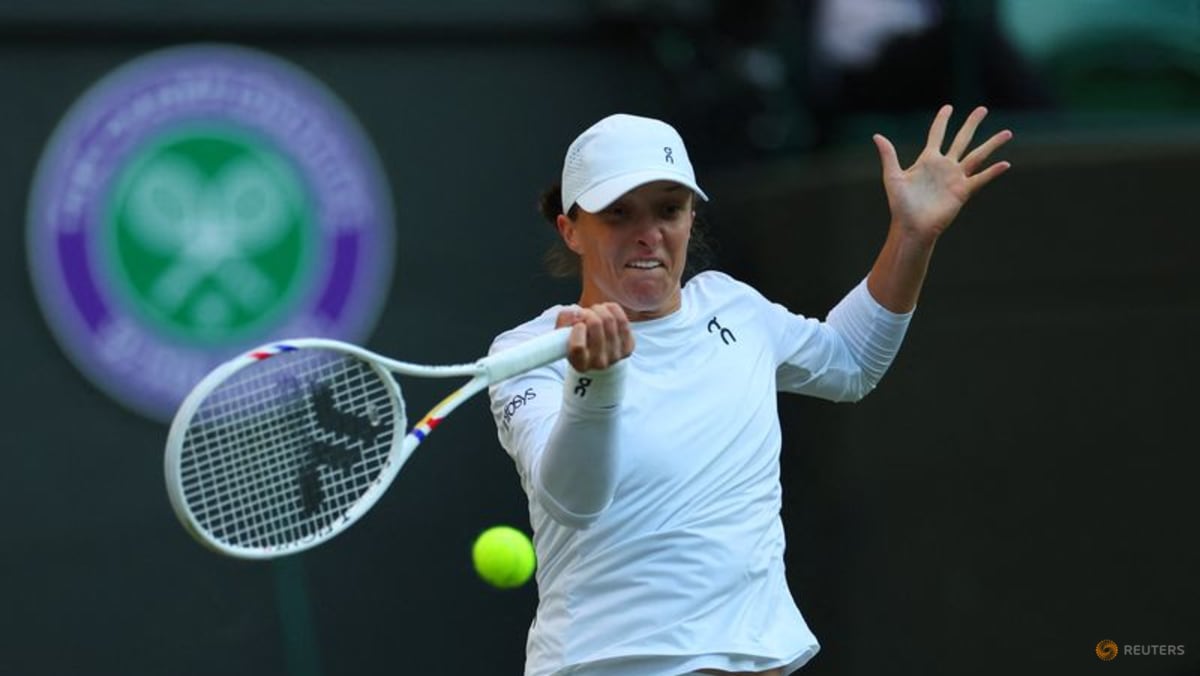 Swiatek ends Tauson's run to fly into Wimbledon quarter-finals - CNA