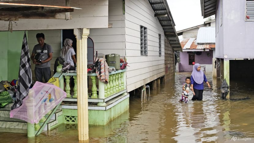 Clean-up begins in Malaysia towns hit by six months of rain in five ...