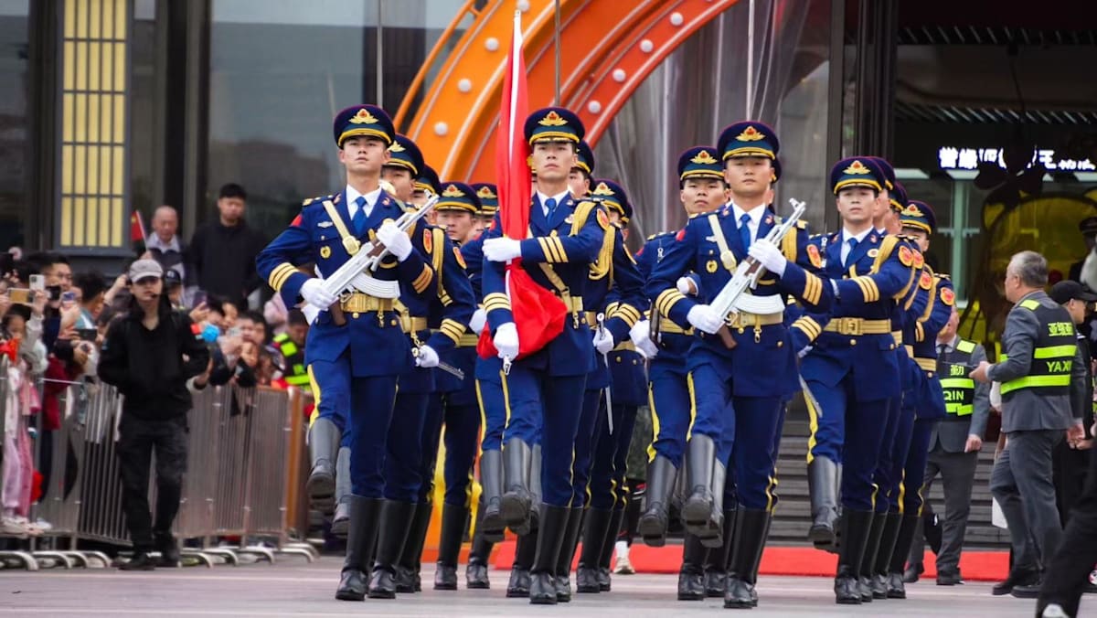 Young patriotic ex-soldiers bring Tiananmen flag ceremony to schools ...