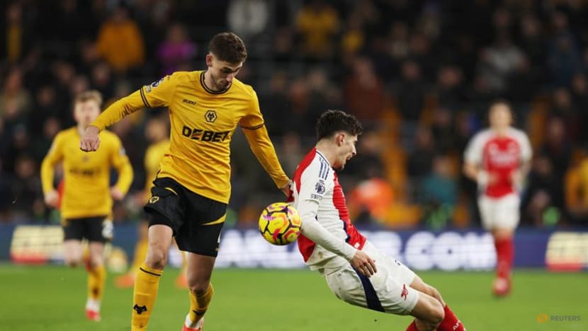 Arsenal keep title race alive with nervy 1-0 win at Wolves - CNA