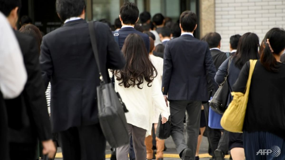 Commentary: Tokyo’s four-day work week offers limited relief for ...