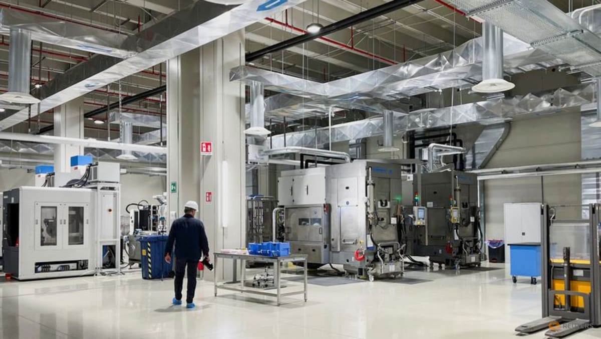 Chipmaker STMicro makes first loss in over a decade, hit by ...