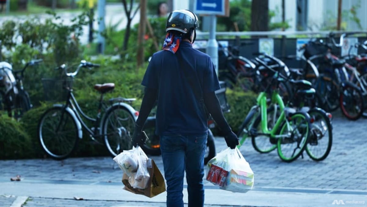 The Big Read: Ubiquitous yet invisible - food delivery riders get short ...