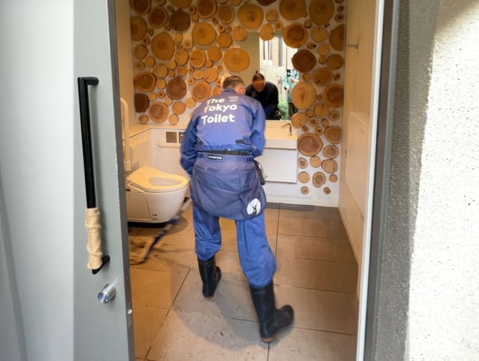 Janitor Cleaning Toilet Commercial Bathroom Cleaning And Sanitization