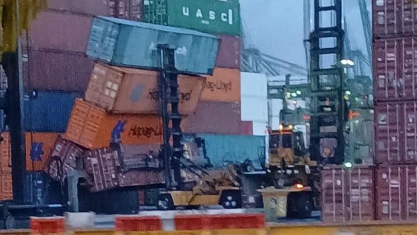Man injured after shipping containers fall on forklift at Pasir Panjang ...
