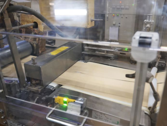 Pocky, Pretz and Osaka's 'Running Man': Behind the scenes at Glico’s factory in Japan - CNA ...