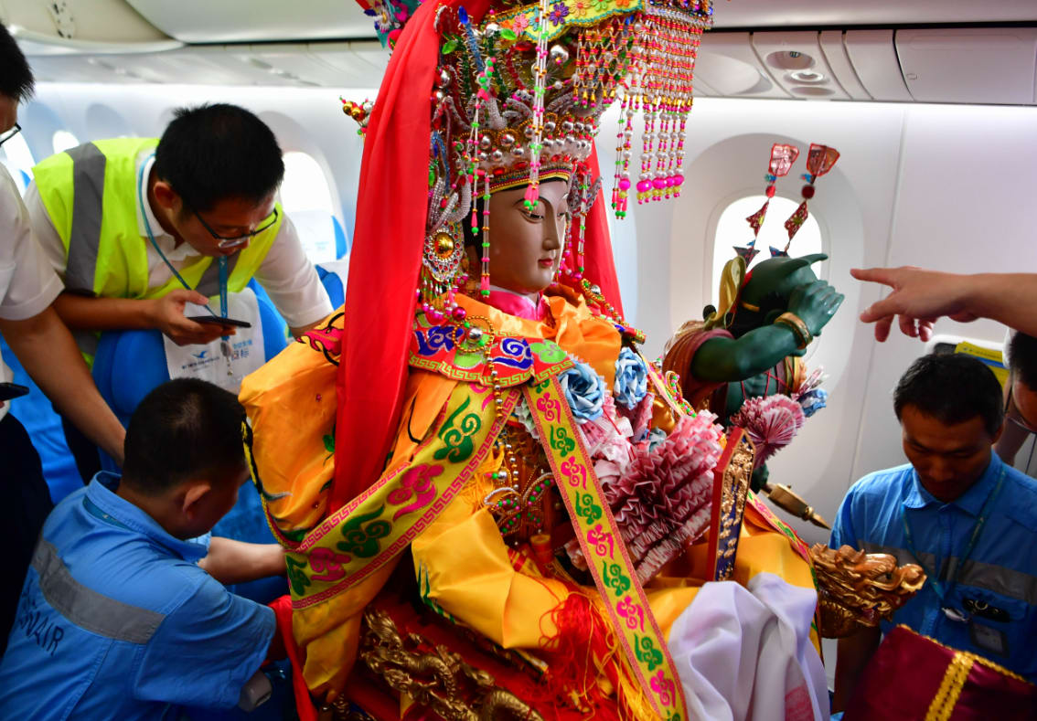 Statue Of Chinese Goddess Seen On Flight, Even Has Her Own Boarding ...