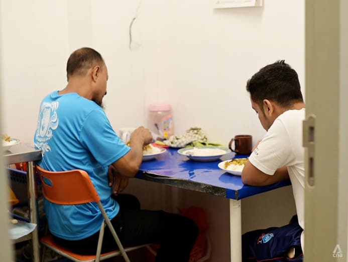 Meet the 2 Bangladeshi caretakers helping rescue dogs at a Singapore shelter - CNA Lifestyle